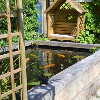 How to Build a Raised Pond with Railway Sleepers | Suregreen Ltd